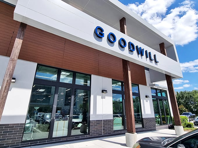 The sleek, modern exterior of Lake Nona's Goodwill breaks every thrift store stereotype. This isn't your grandmother's secondhand shop.