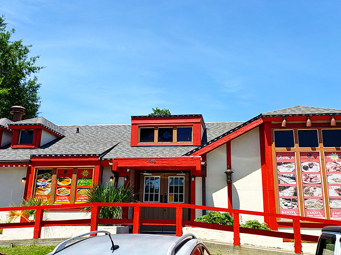 The red-trimmed exterior of Kacey's Buffet glows with promise at dusk, like a beacon calling hungry travelers to a homestyle feast.