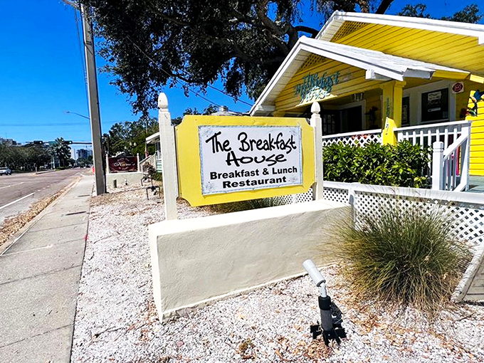 The sunshine-yellow cottage that houses The Breakfast House isn't just a restaurant—it's a morning promise wrapped in cheerful Florida charm.