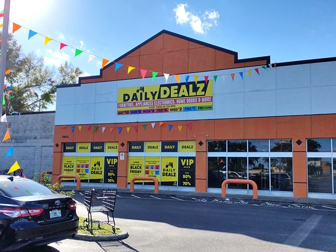 The bright orange facade of Daily Dealz stands out like a bargain beacon, complete with its promise that "Every Day is Black Friday!" No false advertising here.