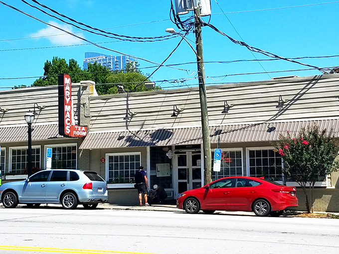 The unassuming blue exterior of Mary Mac's with its iconic vertical sign stands as Atlanta's culinary lighthouse, beckoning hungry souls to Southern salvation.