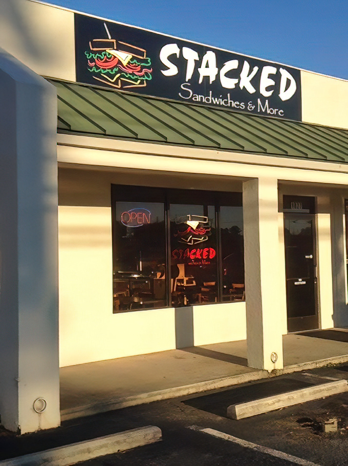 The modest facade of Stacked Sandwiches belies the culinary treasures within. Like finding Shakespeare in a paperback, appearances deceive deliciously.