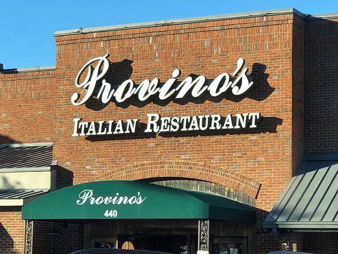 The iconic brick fa&ccedil;ade and emerald awning of Provino's stands as a beacon of hope for the pasta-deprived masses of Kennesaw.