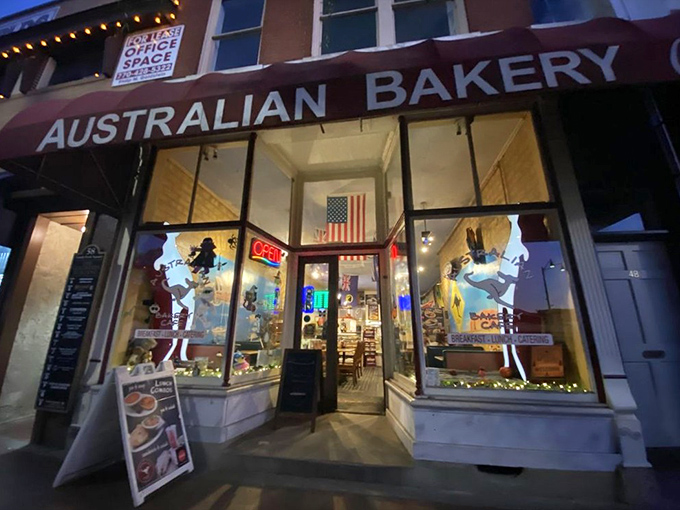 The red awning beckons like a culinary lighthouse on Marietta Square, promising authentic Down Under delights that'll make you forget you're in Georgia.