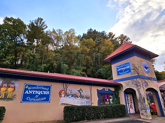 The blue clock tower of Wonderland Antiques stands like a storybook portal in Helen, complete with Alice-themed murals inviting curious souls to tumble down the rabbit hole.
