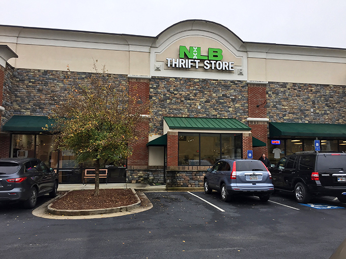 The stone-and-brick exterior with that signature bright green signage serves as a beacon for bargain hunters throughout Woodstock. Hidden treasures await inside!
