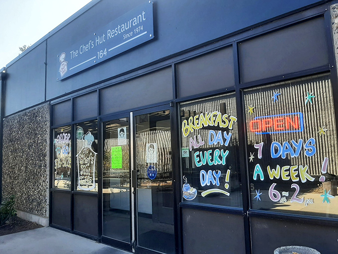 The unassuming blue exterior of The Chef's Hut promises no frills, just honest-to-goodness breakfast mastery that locals have treasured for decades.