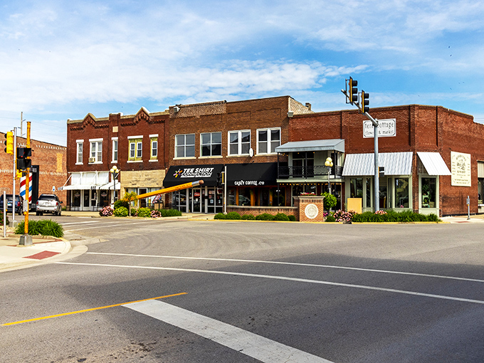 Downtown Casey welcomes you with classic Midwest charm, red brick buildings standing proud against blue skies like sentinels of small-town hospitality.