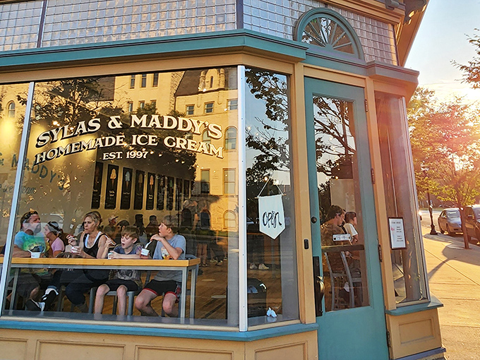 The corner shop that launched a thousand cravings. Sylas and Maddy's teal-trimmed storefront promises sweet salvation on even the hottest Kansas days.