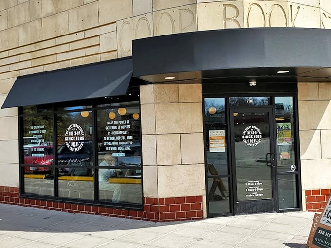 The limestone storefront of The Dusty Bookshelf stands like a literary lighthouse in Manhattan's Aggieville, beckoning to both dedicated readers and casual browsers alike.