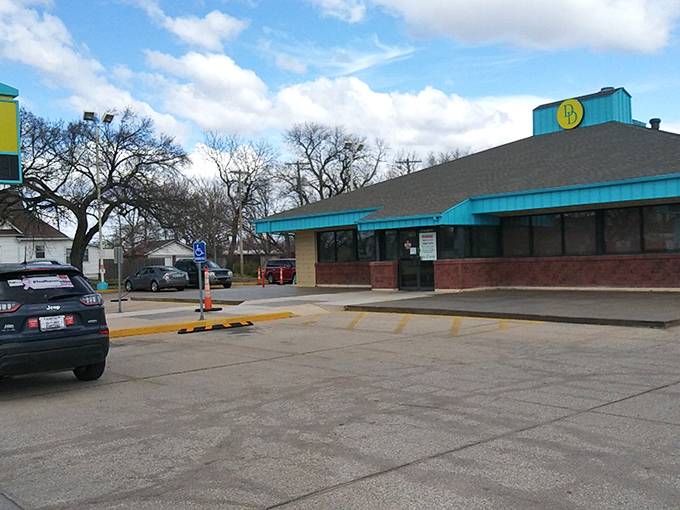 A blue beacon of breakfast bliss! Delano's Diner stands ready to satisfy your morning cravings, like a lighthouse guiding hungry sailors to shore.