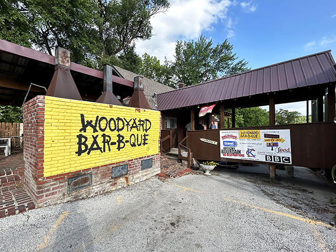 That bright yellow wall isn't just eye-catching&mdash;it's a beacon for barbecue pilgrims. Woodyard's humble exterior houses smoking treasures that have made it a Kansas City legend.