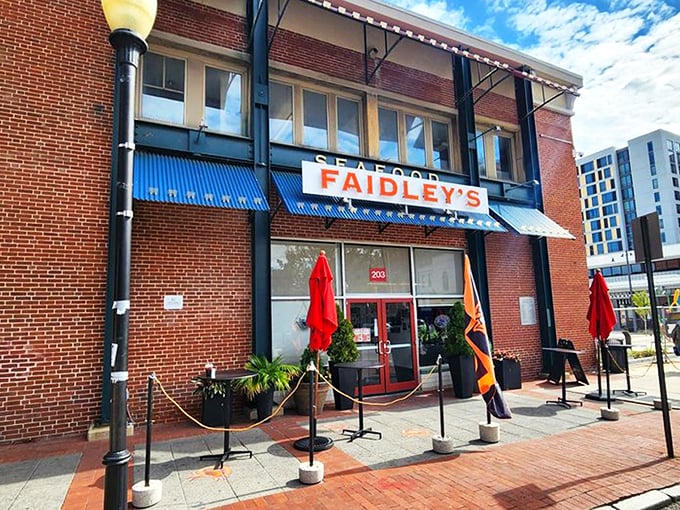 The brick facade of Faidley's stands like a seafood shrine in Baltimore, its vintage sign promising treasures from the Chesapeake that have delighted generations.