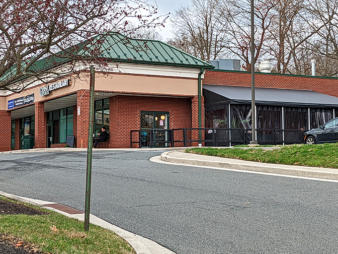 The unassuming storefront of G&A Restaurant beckons with its vintage orange awning &ndash; a time capsule of flavor waiting to be discovered.
