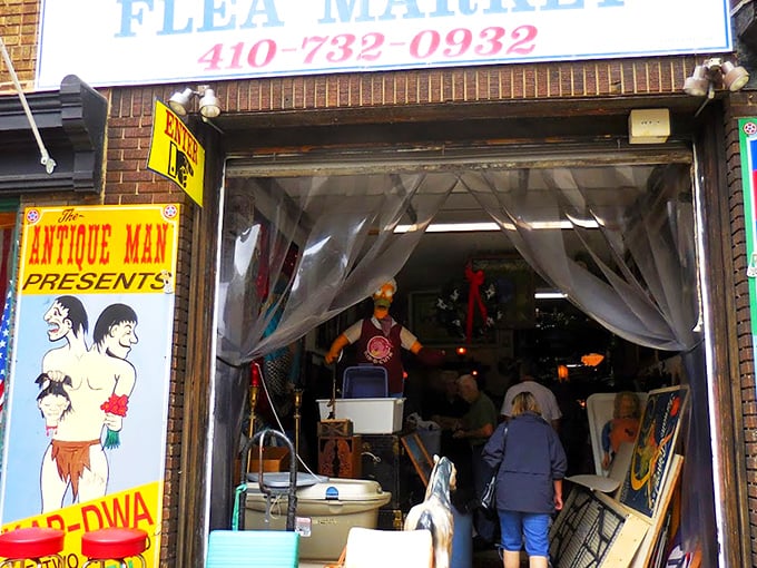 The exterior mural transforms this brick building into a vibrant landmark. Who needs subtle signage when you can have a giant hand holding a flower against the sky?