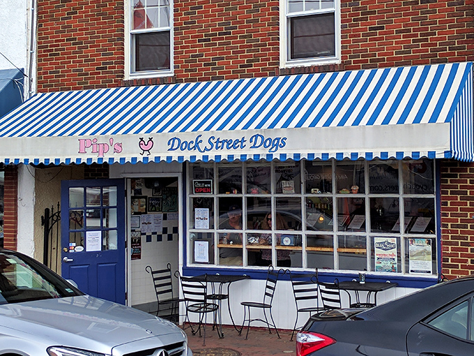 The little blue awning on Dock Street beckons like a nautical flag signal that translates to "Come get the best hot dogs in Annapolis right here!"