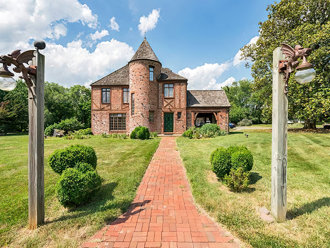 Redwall Castle stands proudly against the Maryland sky, its reddish-brown stonework and circular turret looking like it was plucked straight from a European countryside.