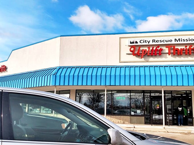 That iconic blue awning signals treasure-hunting territory ahead. Like a retail oasis in Lansing's shopping landscape.