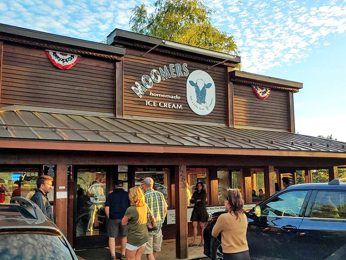 The iconic red barn of Moomers stands like a beacon of dairy delight, promising cold comfort in a world that's often too heated.