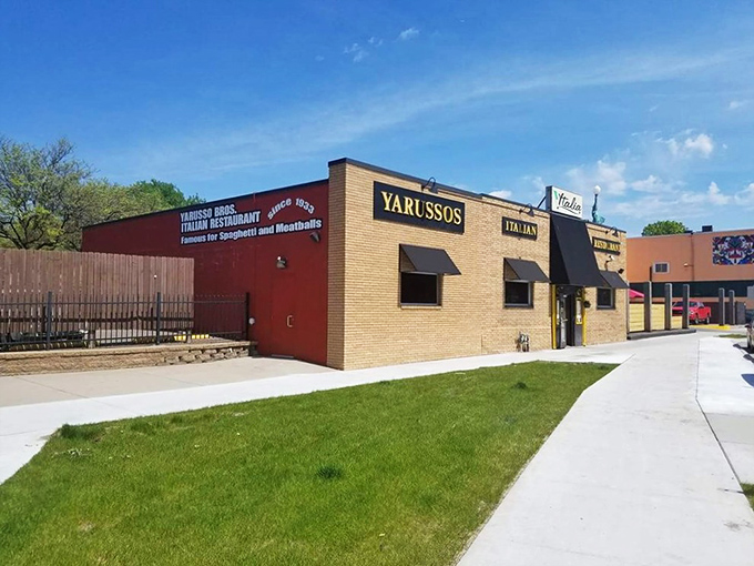 The unassuming exterior of Yarusso Bros stands like a culinary sentinel in St. Paul's East Side, promising Italian treasures within those brick walls.