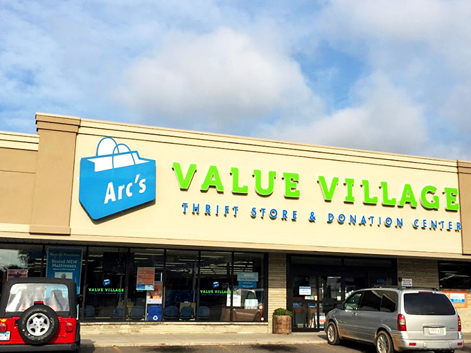 The beige facade with bright blue and green signage isn't just a storefront—it's the gateway to Minnesota's most ambitious treasure hunt.