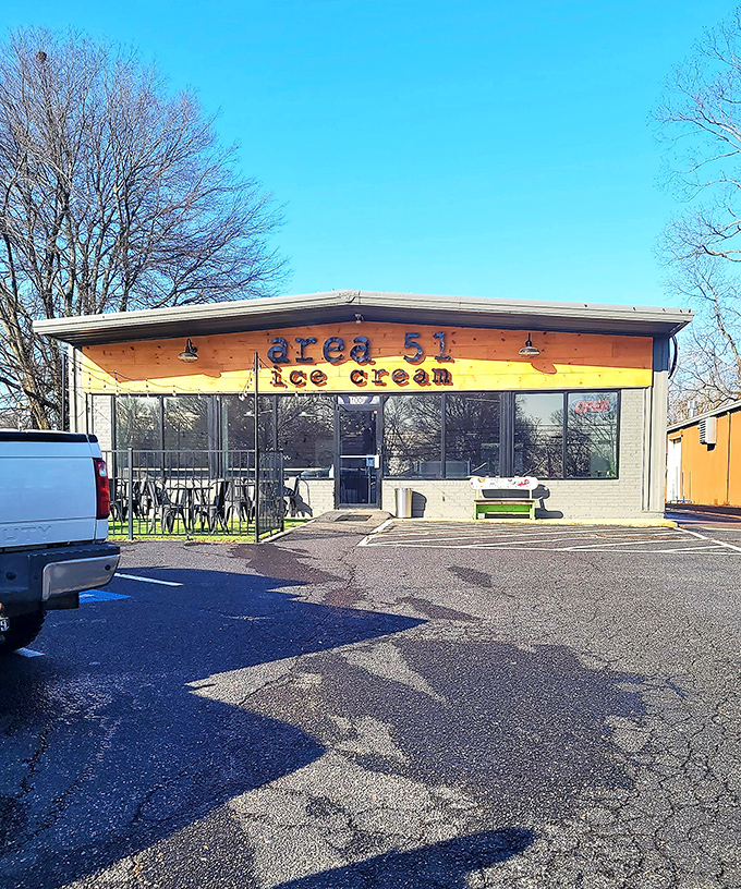 The illuminated wooden facade of Area 51 Ice Cream beckons like a beacon of sweetness in the night. Extraterrestrial delights await inside this unassuming Hernando storefront.