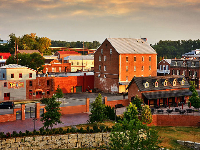 Historic brick buildings line Hermann's main street, where German heritage meets Midwest charm in a postcard-perfect small town setting. 