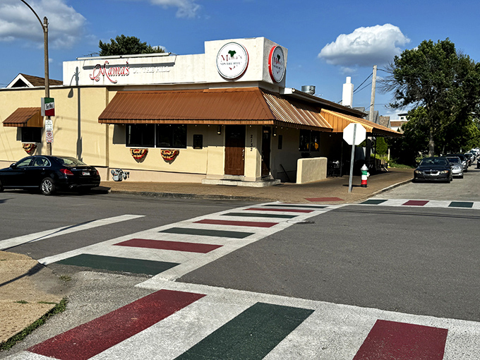 The iconic corner building with its distinctive copper awning stands as a beacon of Italian comfort in St. Louis' historic Hill neighborhood.