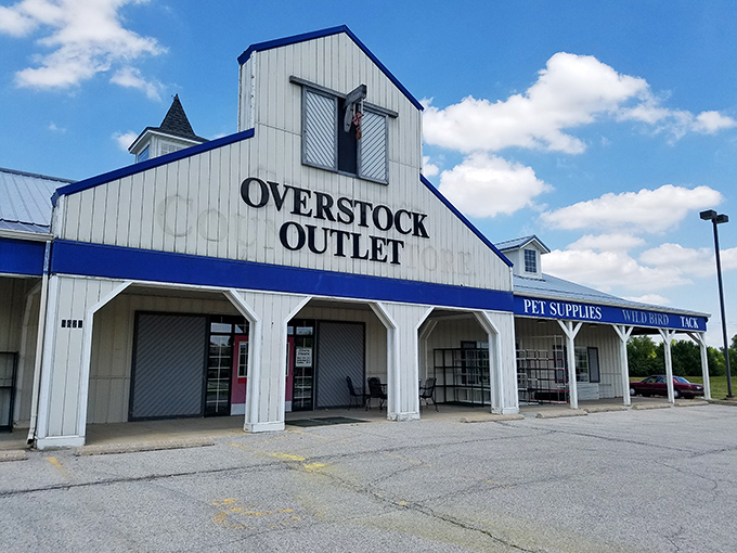 The unassuming barn-style exterior of Overstock Outlet promises treasure within&mdash;like finding a secret gold mine disguised as a humble homestead.