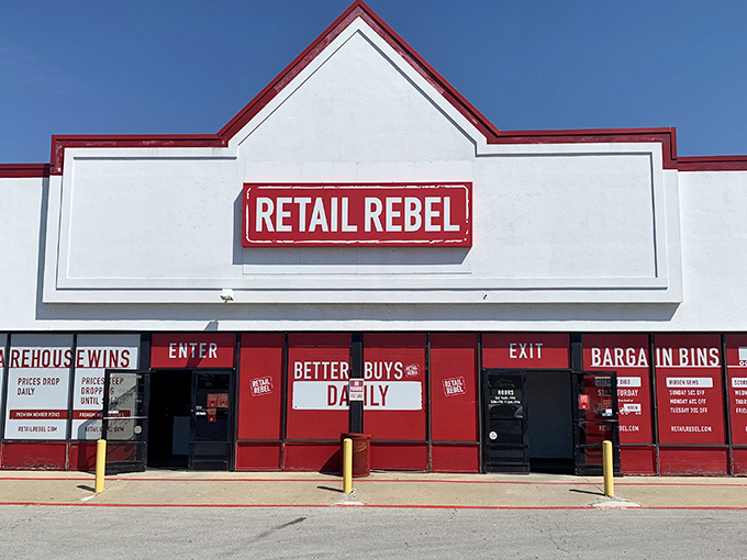 The red-trimmed fa&ccedil;ade of Retail Rebel stands like a beacon of bargain hope against the Missouri sky, promising treasures within for the deal-savvy shopper. 