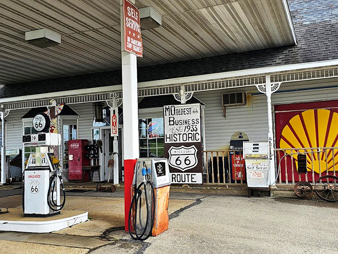 The weathered sign proclaiming "MO. OLDEST BUSINESS EST. 1933" isn't marketing spin&mdash;it's a time-travel invitation with a vintage Coke machine as your welcome committee. 