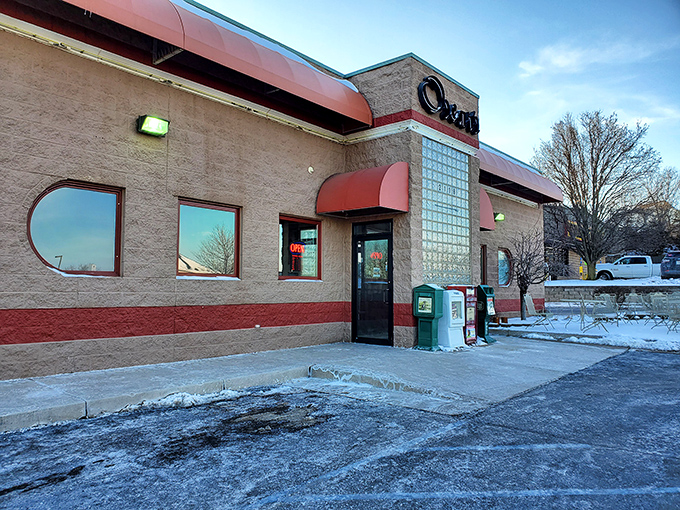 Oscar's welcoming exterior promises comfort food paradise with its distinctive red awnings and classic brick fa&ccedil;ade&mdash;like a time machine to simpler, delicious days. 
