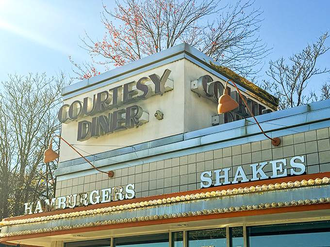 Courtesy Diner's retro sign beckons like a lighthouse for the hungry, promising comfort food and a slice of Americana.