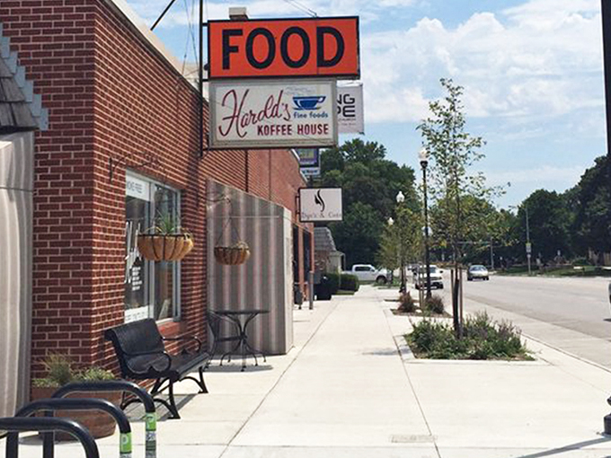 Harold's brick exterior stands like a time capsule on North 30th Street, complete with vintage signage and a welcoming bench that practically whispers "slow down."