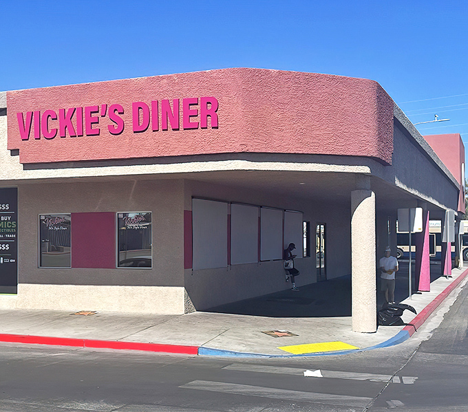 The pink beacon of breakfast hope on the Las Vegas horizon. Vickie's Diner's exterior promises comfort food salvation in a city that never sleeps.