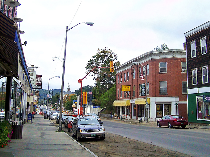 Littleton's iconic white building with its distinctive clock tower stands like a sentinel over Main Street, where Norman Rockwell scenes come to life daily.
