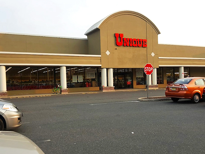 The green-trimmed fa&ccedil;ade with its bold red sign isn't just inviting shoppers &ndash; it's practically daring you to discover what treasures await inside.