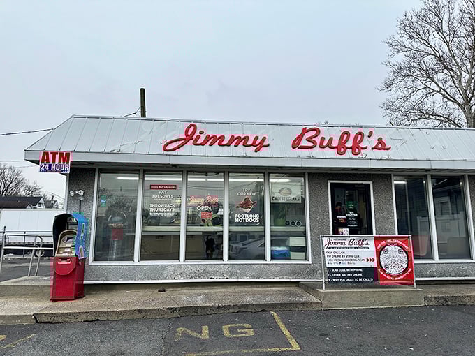 The iconic Jimmy Buff's sign stands sentinel against a perfect blue New Jersey sky, promising Italian hot dog perfection to all who approach.