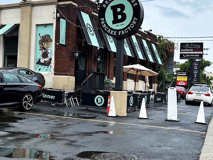 The iconic brick exterior with mint-green awnings promises breakfast dreams come true. This Edgewater landmark has become a pilgrimage site for waffle worshippers across New Jersey.