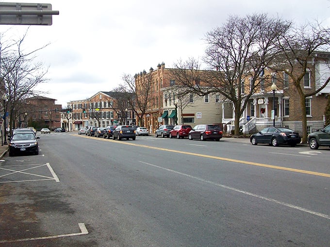 Skaneateles Lake stretches like nature's runway, its pristine blue waters flanked by emerald shorelines that promise relaxation and waterfront dining adventures.