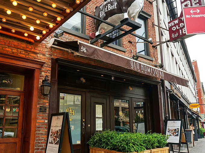 The historic brick facade of Old Homestead stands like a carnivore's beacon in the Meatpacking District. Those vintage lights have illuminated countless memorable evenings.