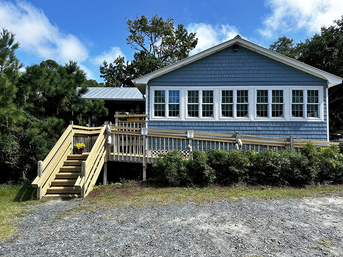 The climb up these wooden steps feels like a pilgrimage to culinary heaven. Green-shingled charm awaits. 