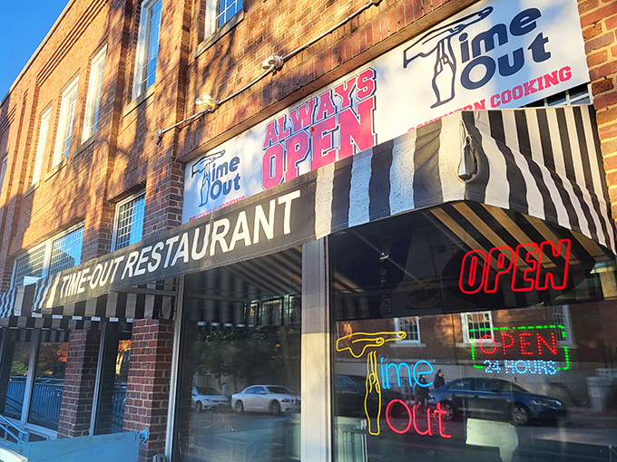 The brick facade of Time-Out beckons hungry visitors with its iconic striped awning and neon signs&mdash;a 24/7 beacon of Southern comfort on Franklin Street.