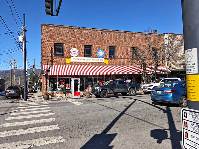 Brevard's crown jewel beckons with its classic red-striped awning and cherry blossom canopy. Time travel never looked so deliciously inviting.