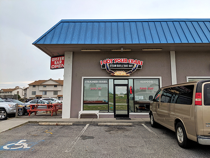 The unassuming exterior hides seafood greatness within, like finding a pearl in the most ordinary-looking oyster. Blue signage beckons hungry travelers.