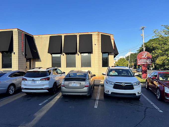 The unassuming exterior of Landmark Diner stands as Charlotte's culinary fortress &ndash; modest architecture hiding extraordinary flavors within.