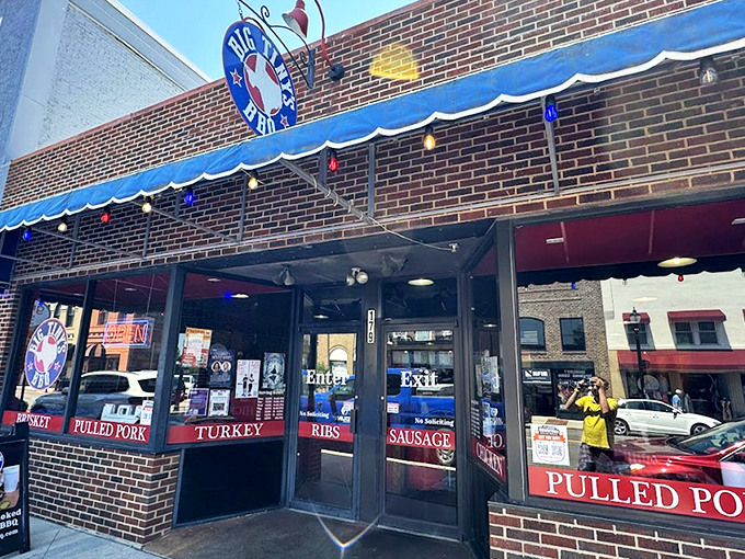 The neon "OPEN" sign at Big Tiny's isn't just an invitation&mdash;it's a siren call to barbecue pilgrims. Those colorful string lights aren't decorations; they're beacons of smoked meat salvation.