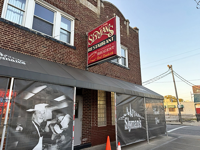 The iconic red Slyman's sign promises "Cleveland's Biggest and Best Corned Beef Sandwiches" &ndash; a bold claim they've been backing up for decades.