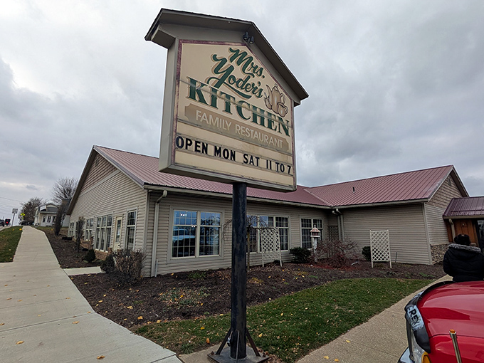 The welcoming sign of Mrs. Yoder's Kitchen stands sentinel in Mt. Hope, promising Amish comfort food that'll make you contemplate moving to Ohio permanently.
