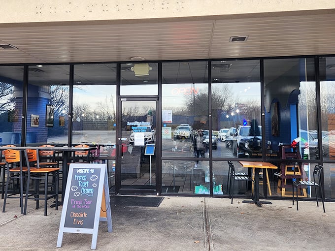 The unassuming storefront might not scream "culinary destination," but that chalkboard sign is like a beacon for breakfast enthusiasts across Ohio.
